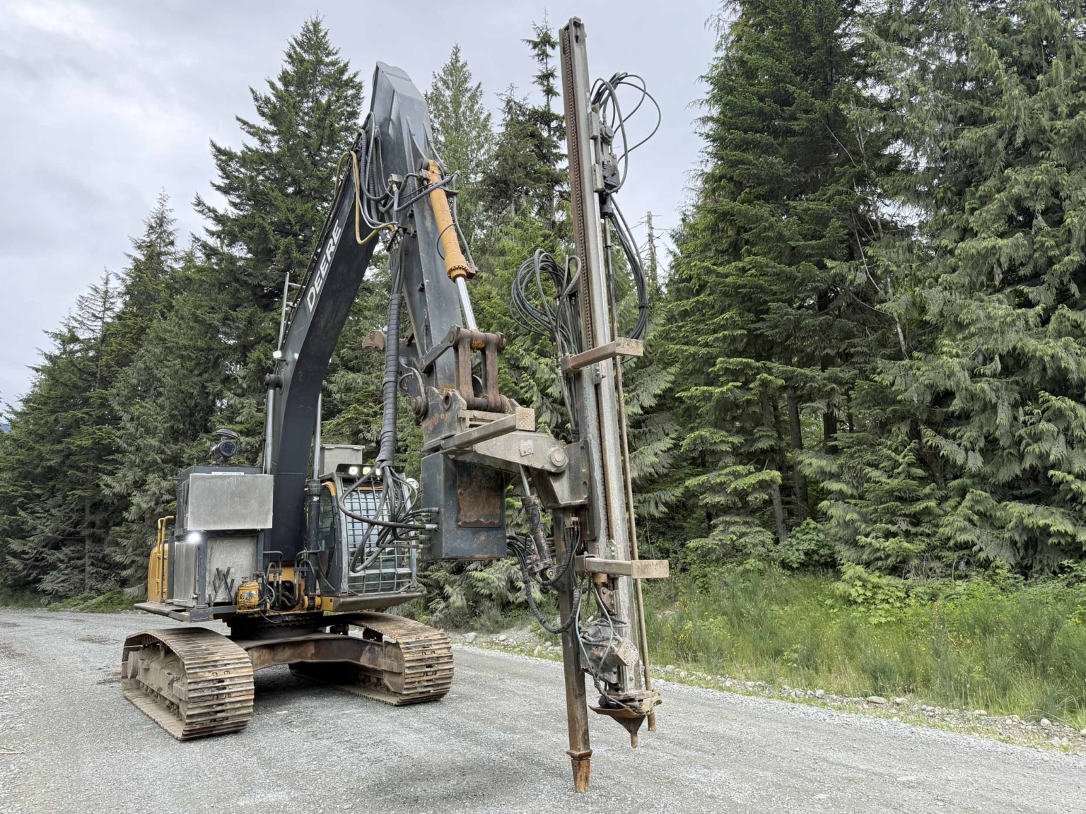 2006 John Deere 270DLC Hydraulic Excavator Drill - Forestech Equipment Ltd.